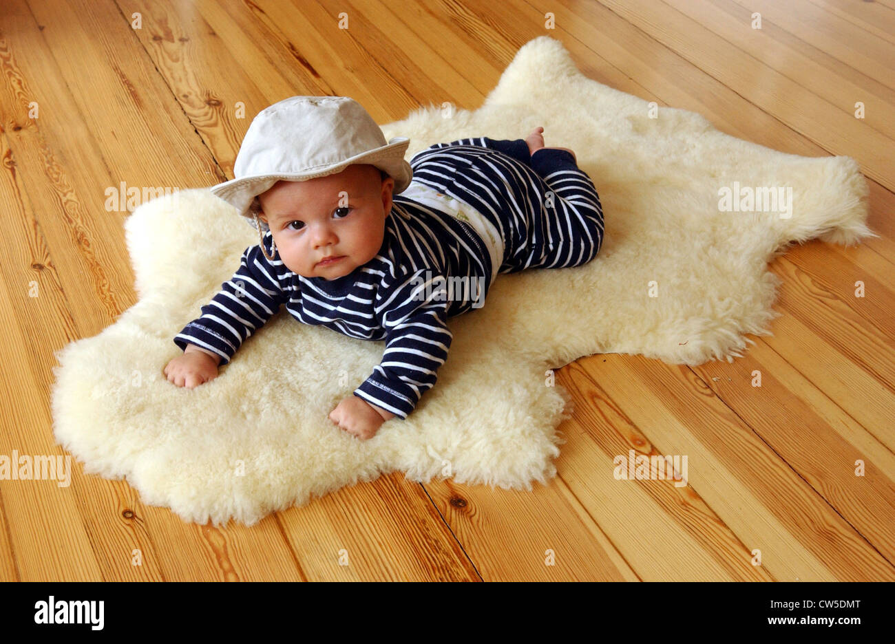 Baby on a fur Stock Photo - Alamy