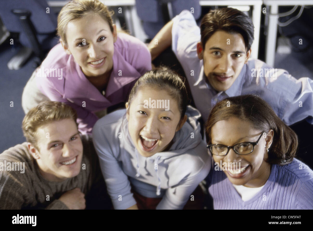 Portrait of a group of teenagers in a classroom Stock Photo - Alamy
