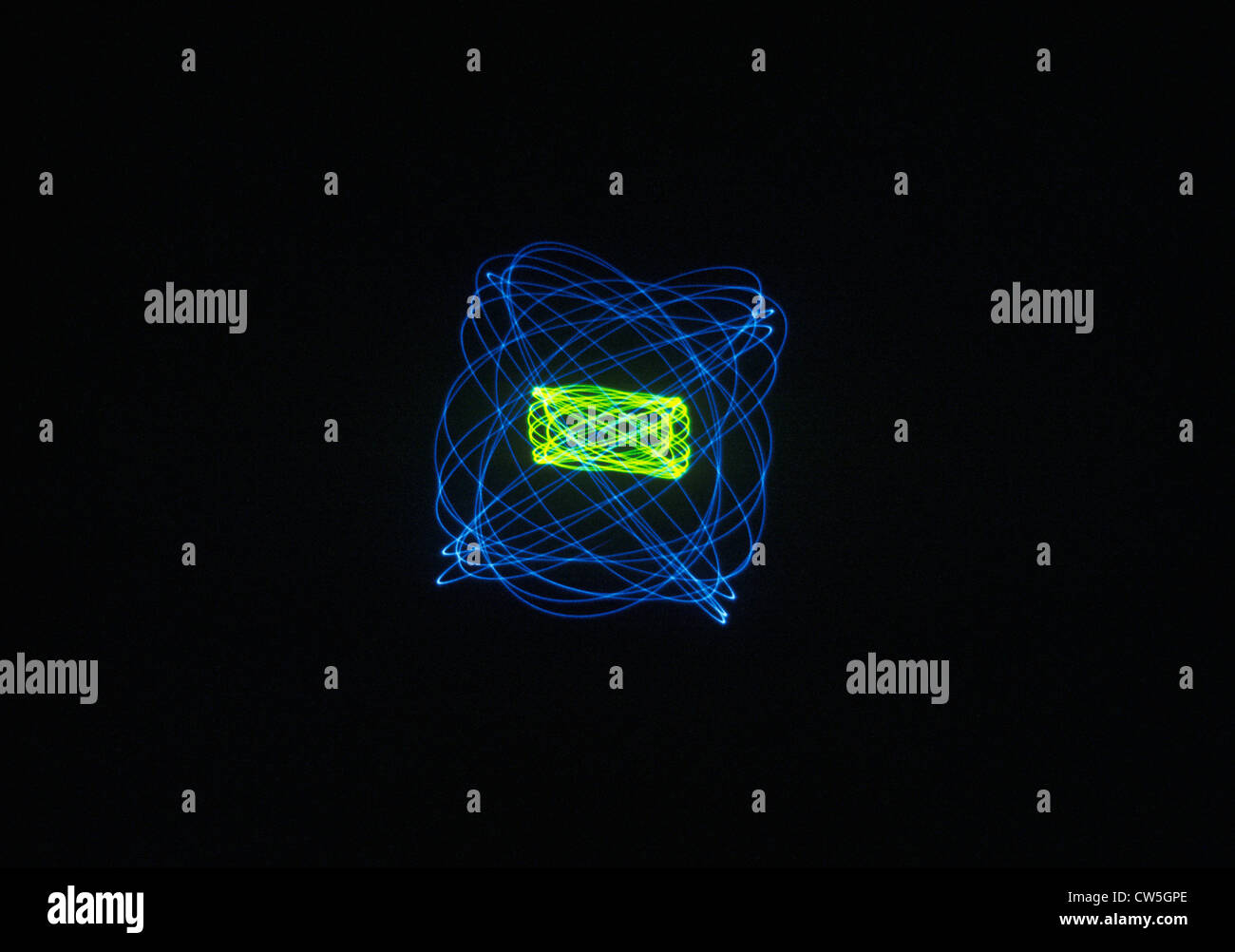 A glowing pattern of laser lights against a black background Stock ...