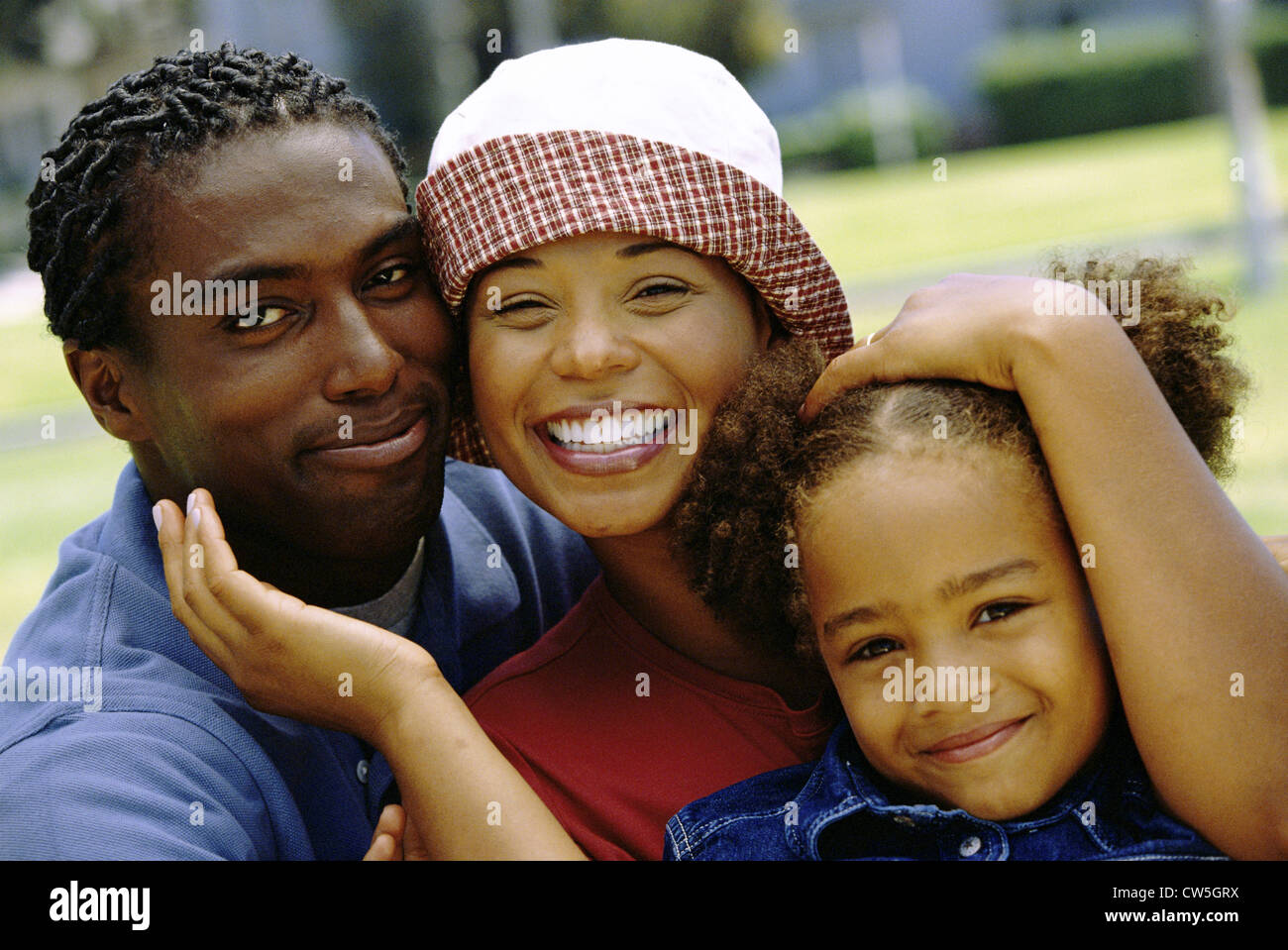 Portrait of parents with their daughter Stock Photo - Alamy