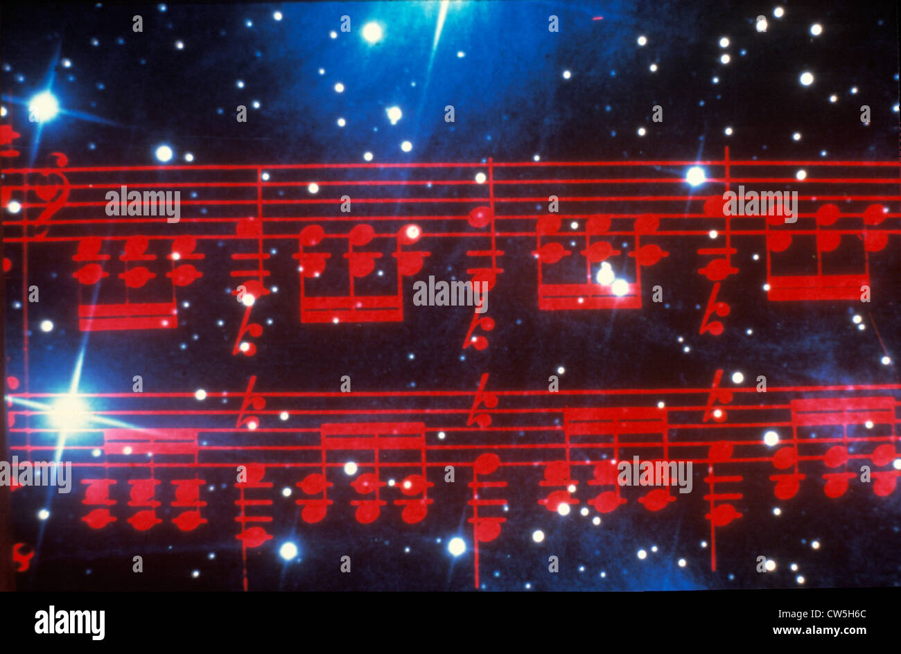 Space special effects composite of red musical notes and starry sky ...