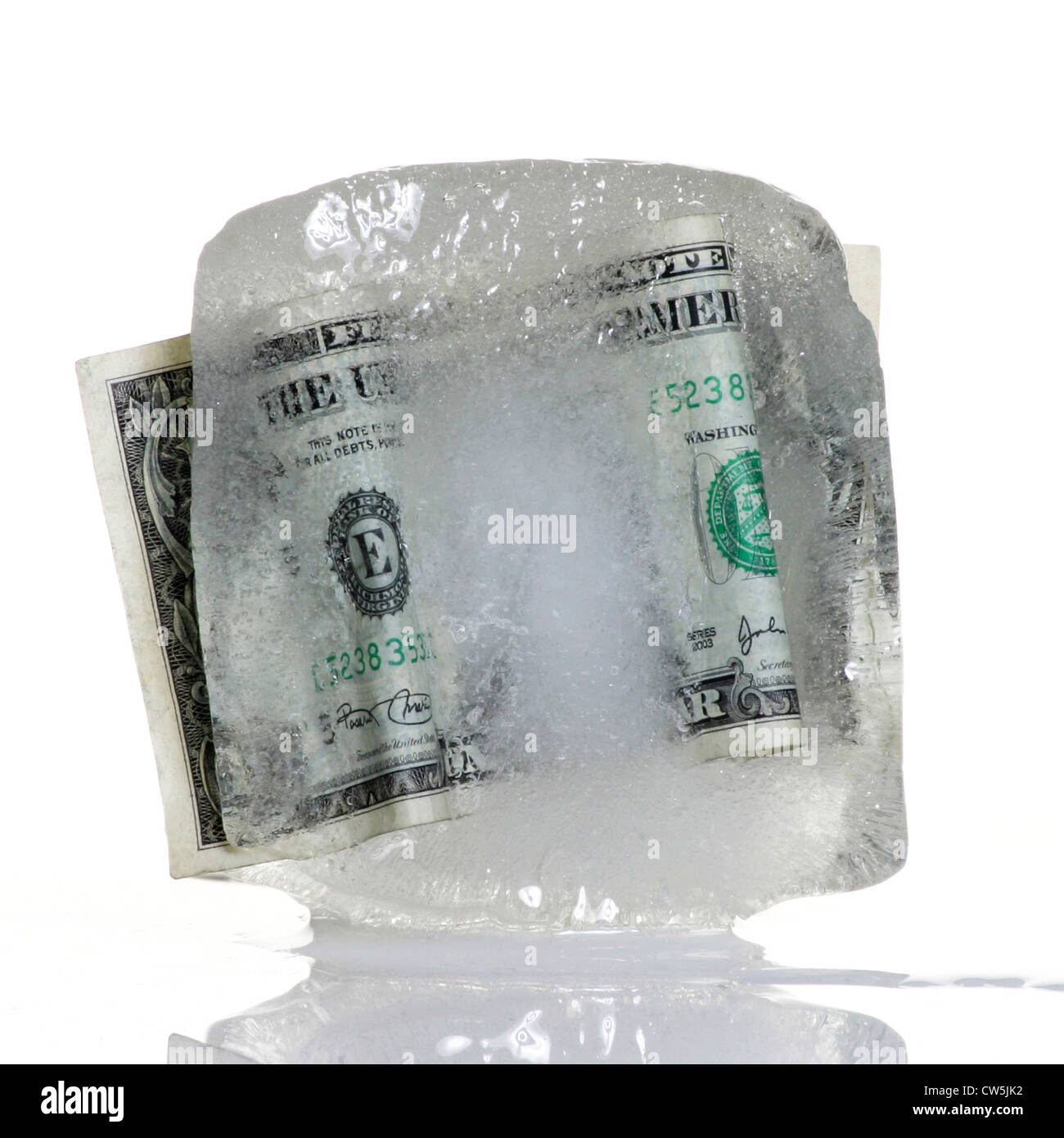 Ice cube dollar bill hi-res stock photography and images - Alamy