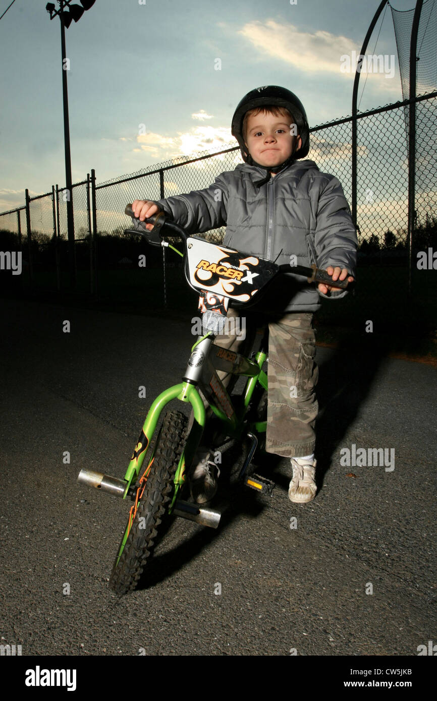 Boy riding a bicycle Stock Photo - Alamy