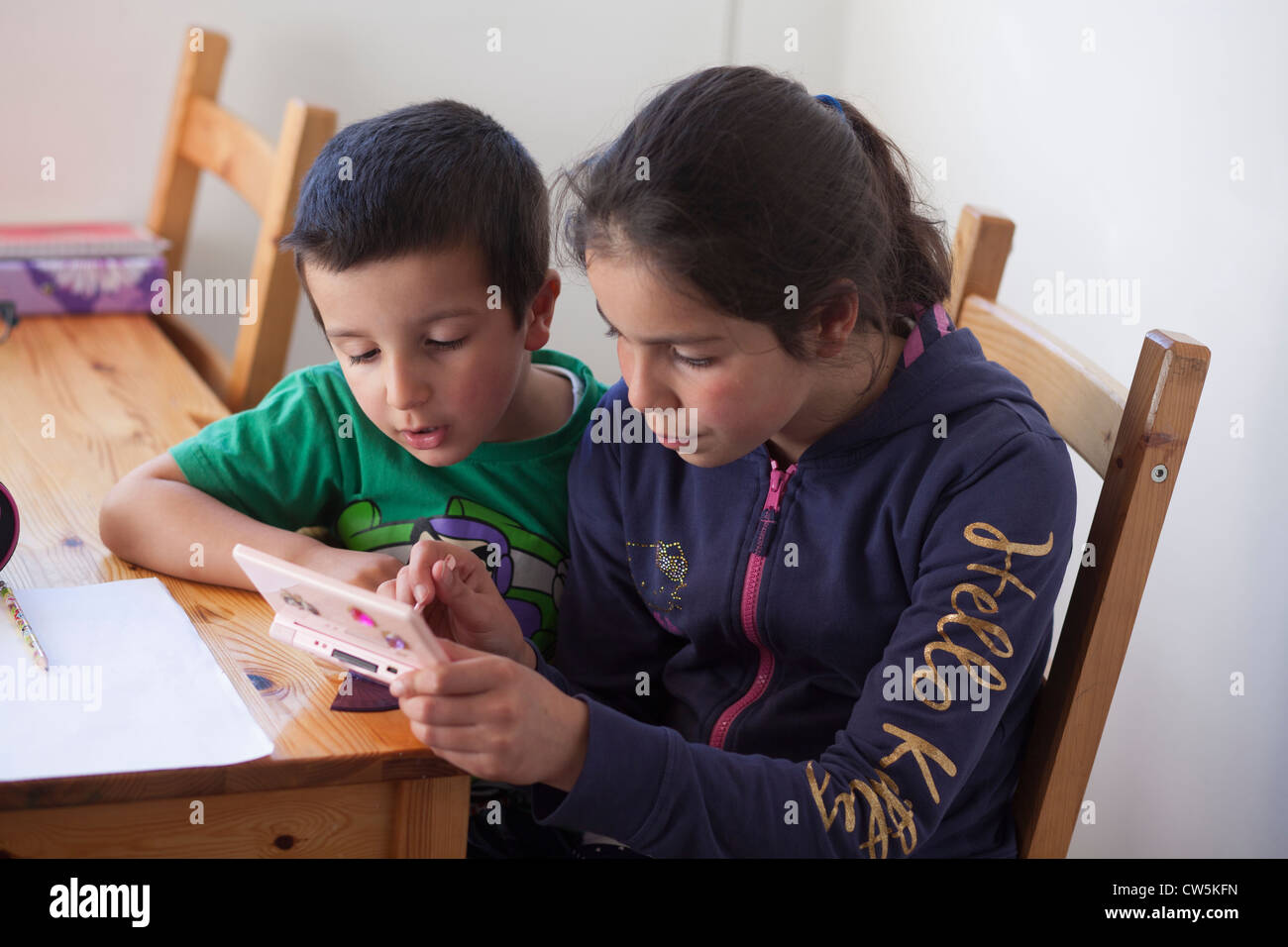 Children playing computer game Stock Photo - Alamy
