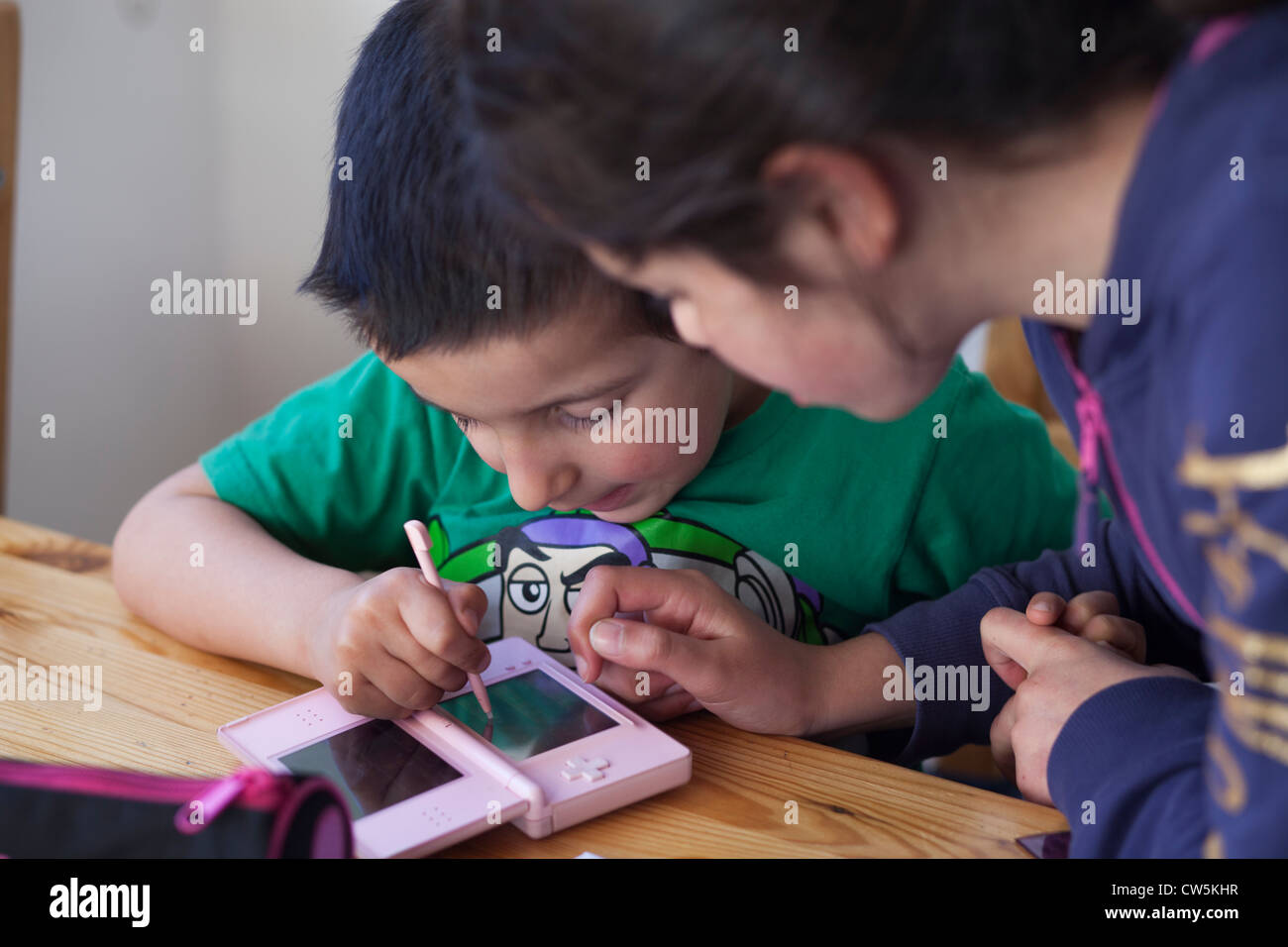 Children playing computer game Stock Photo - Alamy