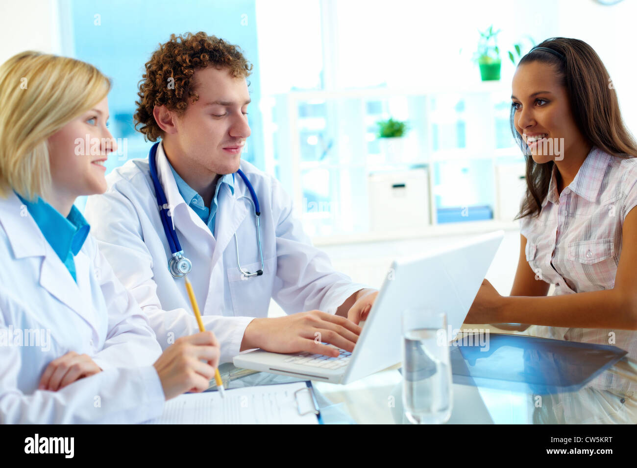 Female physician communicating male patient hi-res stock photography ...