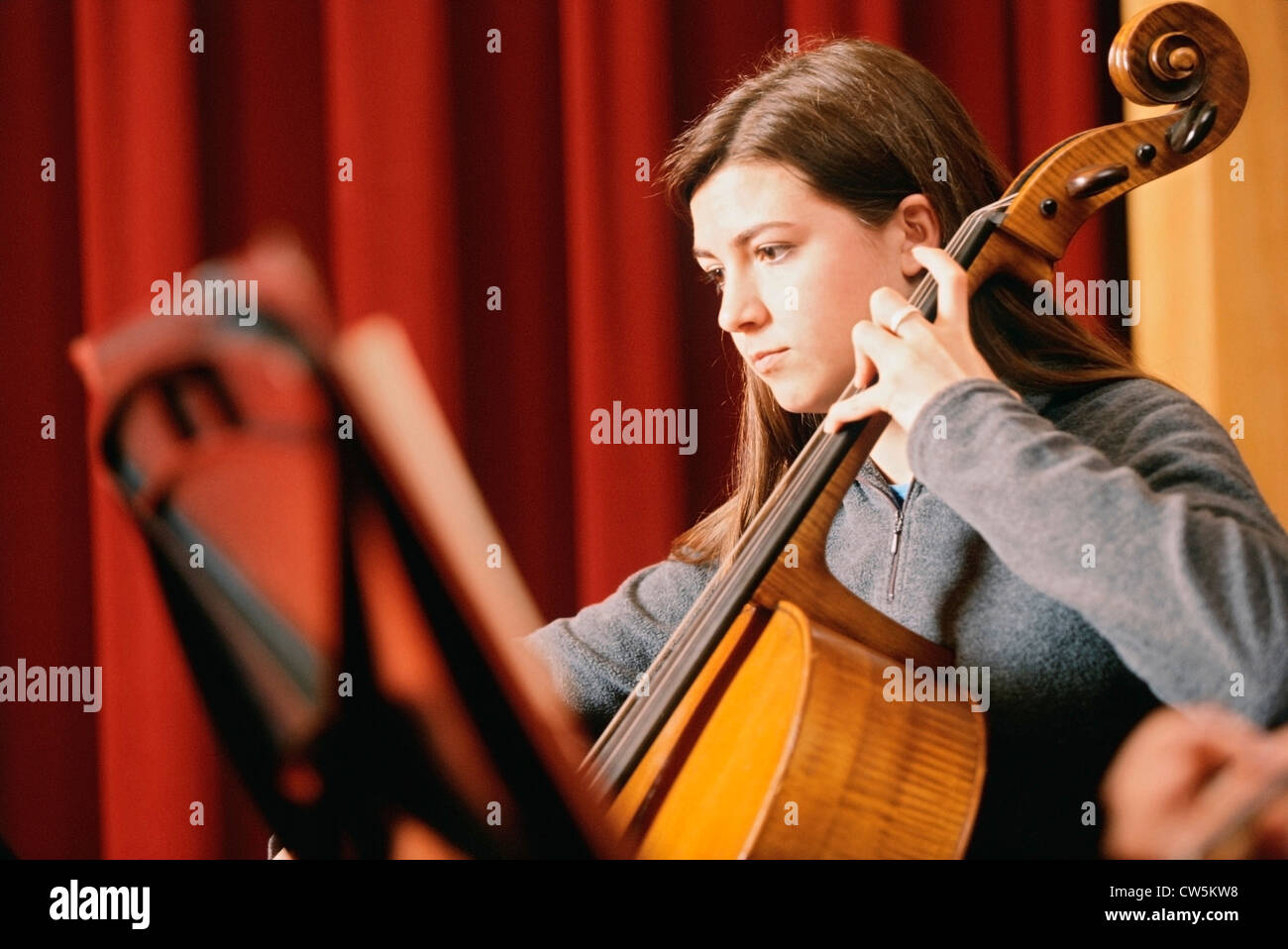 Young woman playing a cello Stock Photo - Alamy