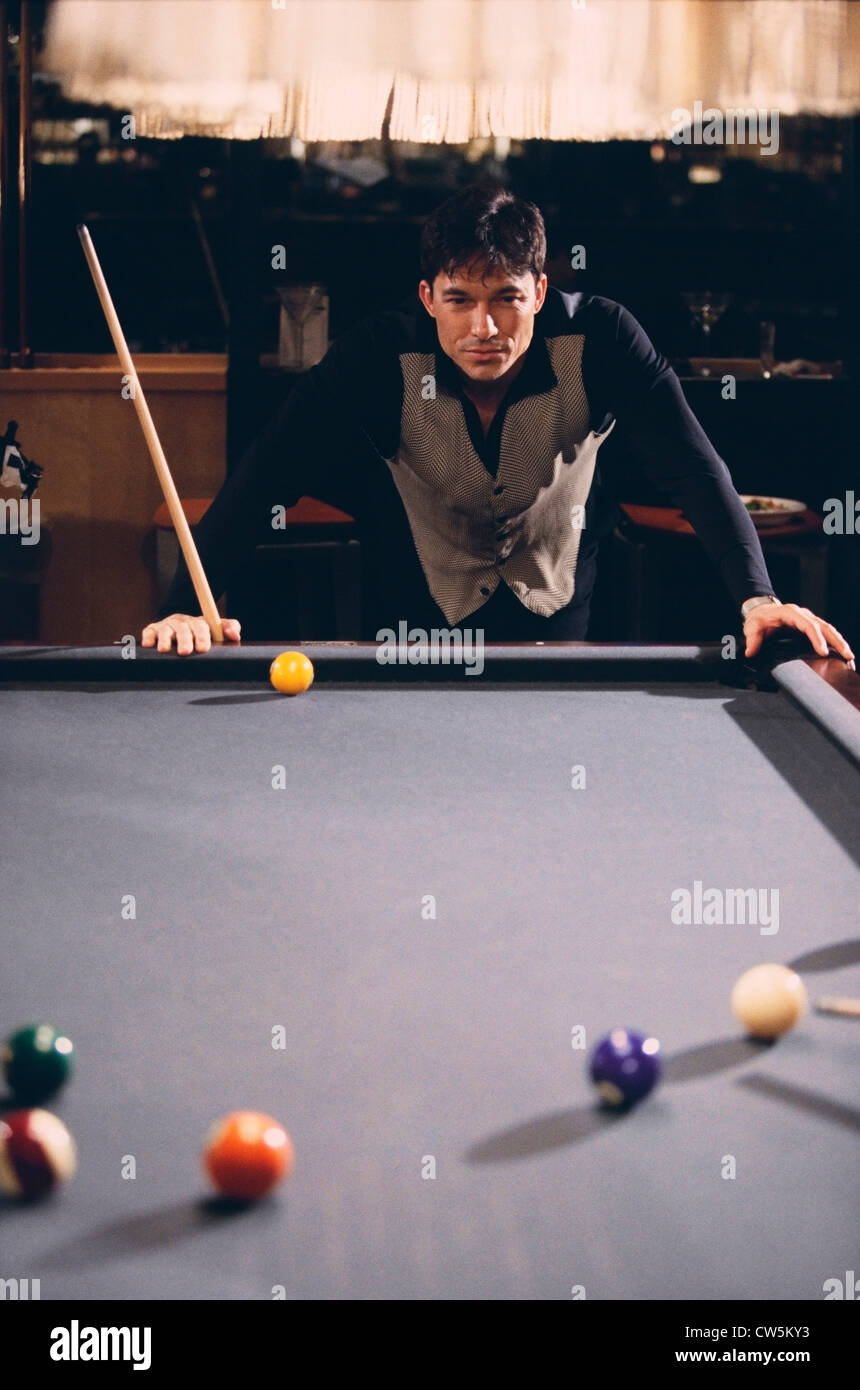 Man playing pool in a billiards bar Stock Photo - Alamy