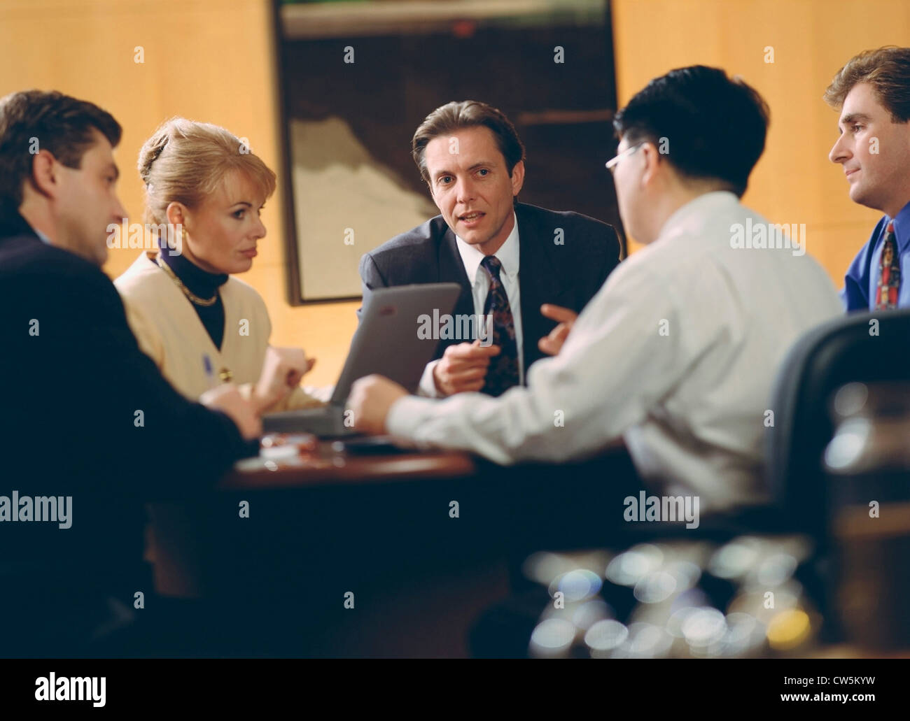 Business executives discussing in a meeting Stock Photo - Alamy
