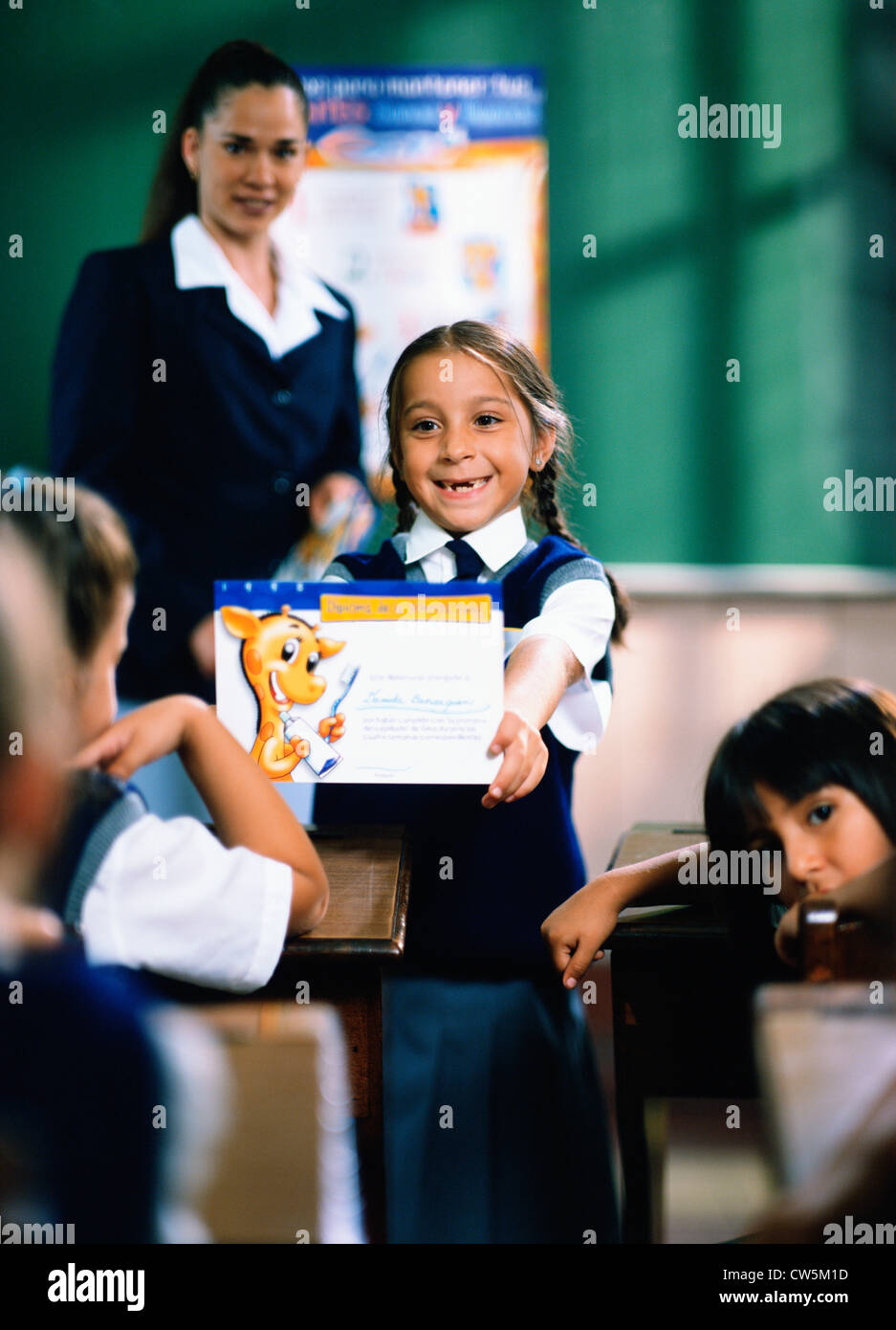 Schoolgirl showing her award Stock Photo - Alamy