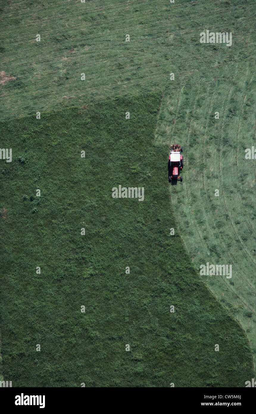 Aerial view of a tractor working in a field Stock Photo - Alamy