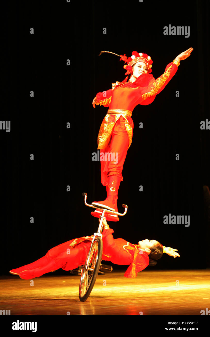 Acrobat on bicycle hi-res stock photography and images - Alamy