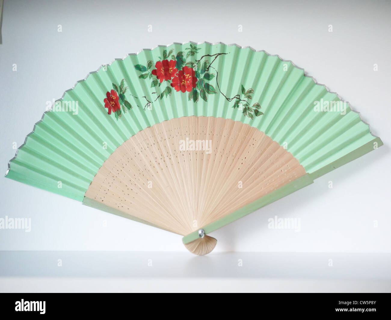 traditional chinese fan green flower pattern Stock Photo - Alamy
