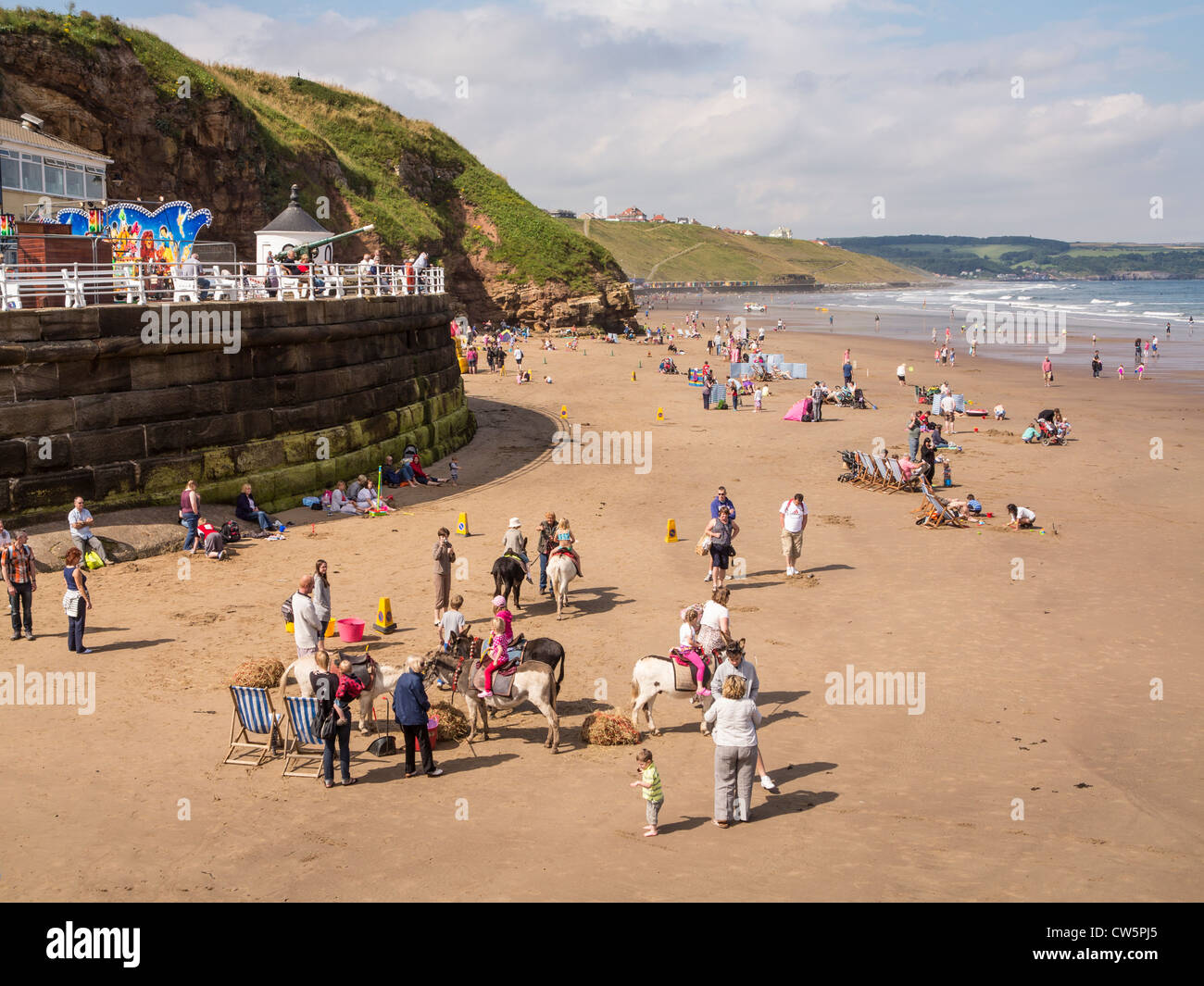 Whitby sands in summer from West Pier Yorkshire UK Stock Photo - Alamy