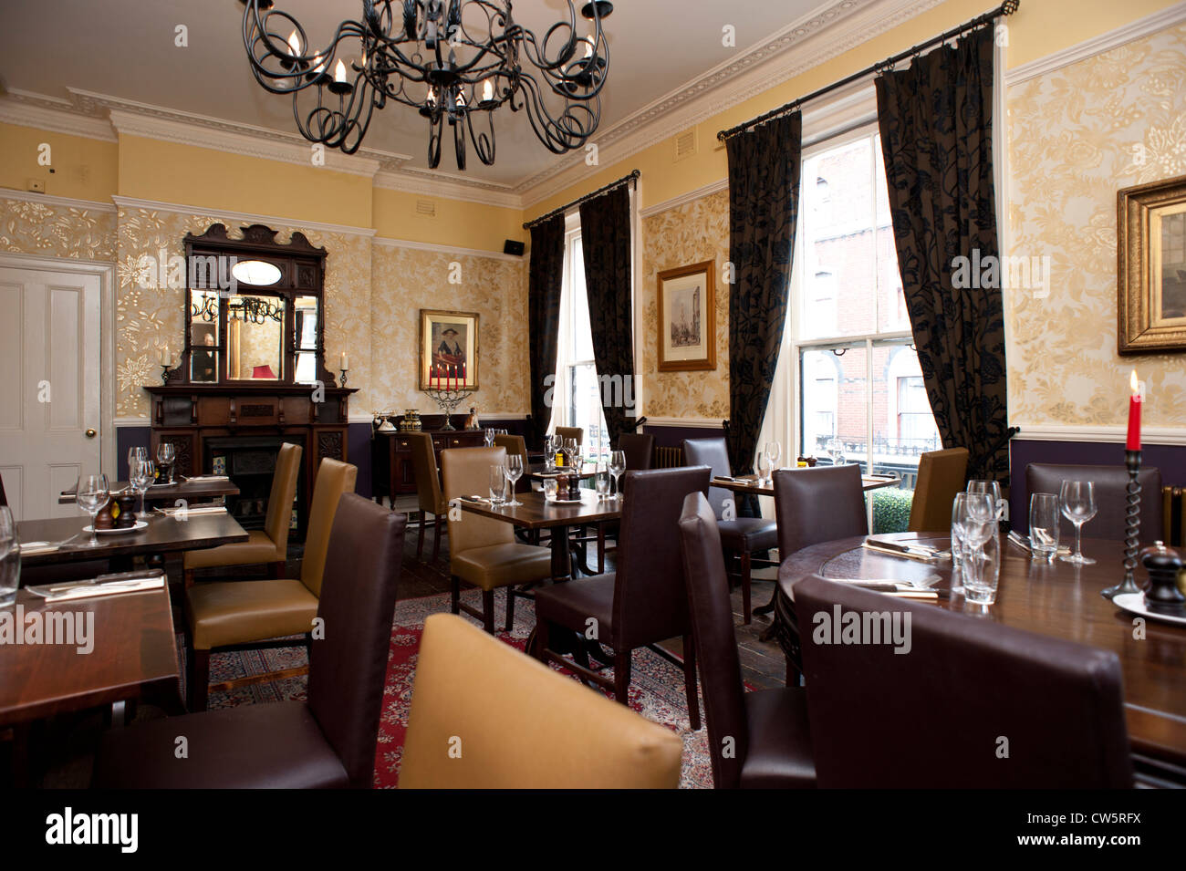 View of the interior of a Victorian style dining room laid out for ...