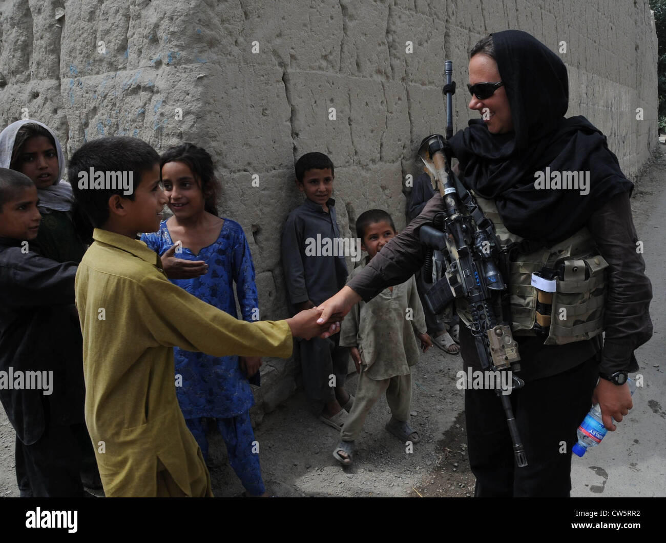 A US Army Cultural Support Team member from Special Operations shakes ...