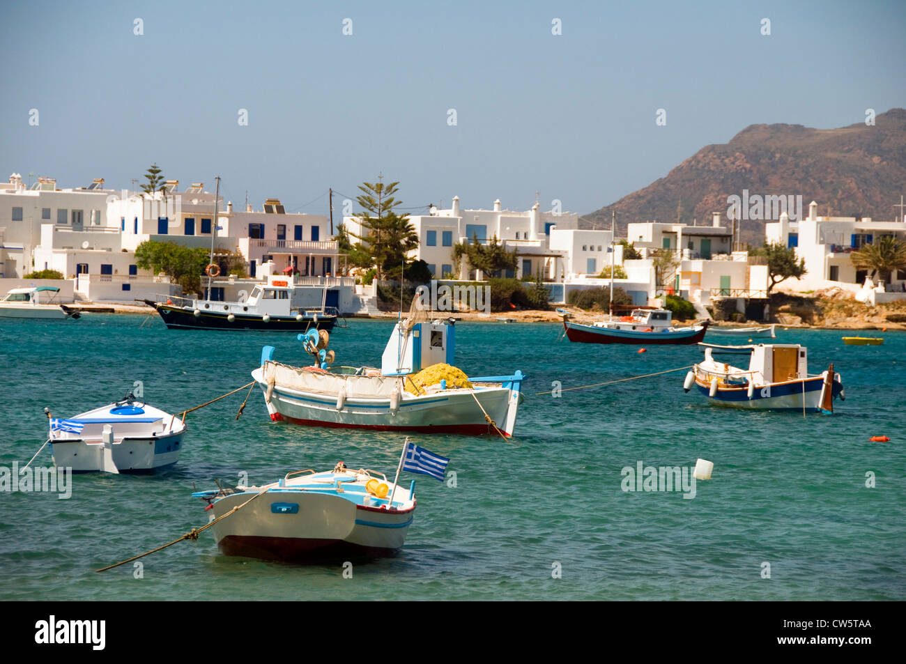 Greek fishing boats with flag typical architecture white block ...