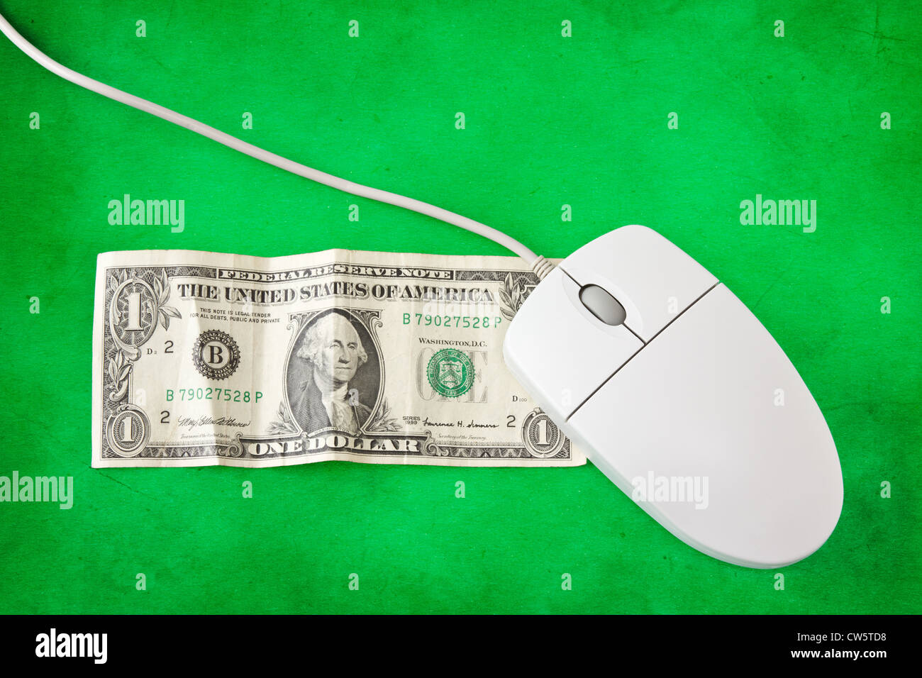 computer mouse placed on one dollar bill Stock Photo - Alamy