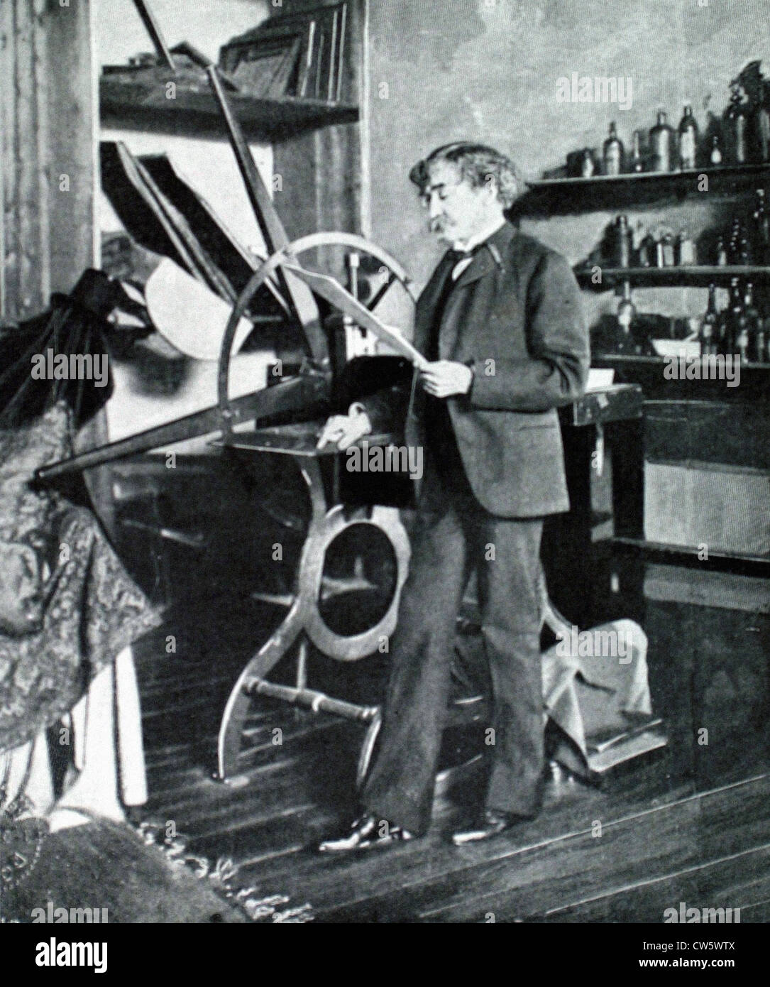 Painter James McNeil Whistler standing by his etching press (1903 Stock ...