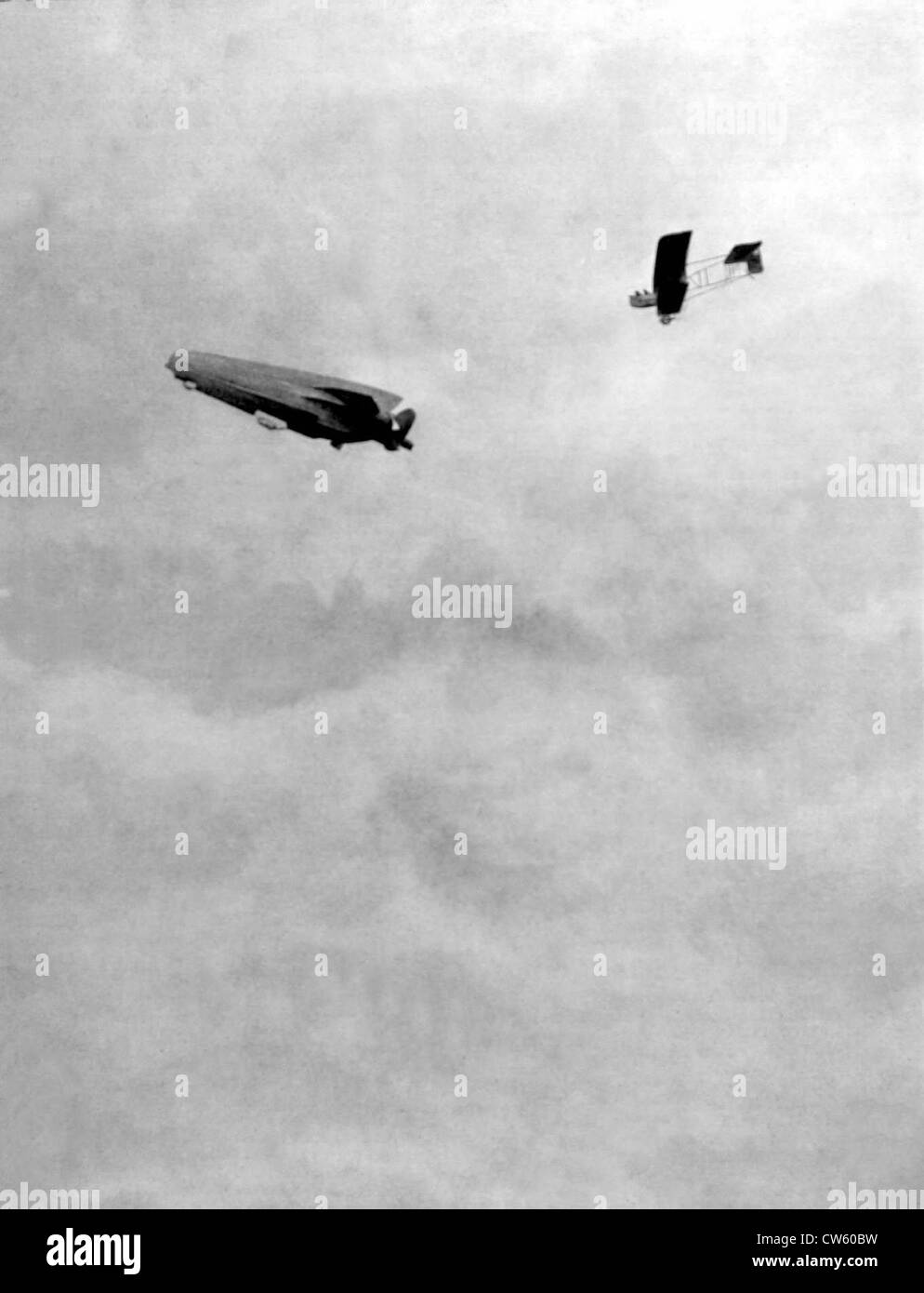 World War I. A Zeppelin being pursued by a French biplane (1915 Stock ...