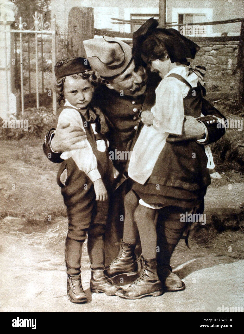 World War I. In Alsace, a soldier playing with young Alsacians (1915 Stock Photo - Alamy