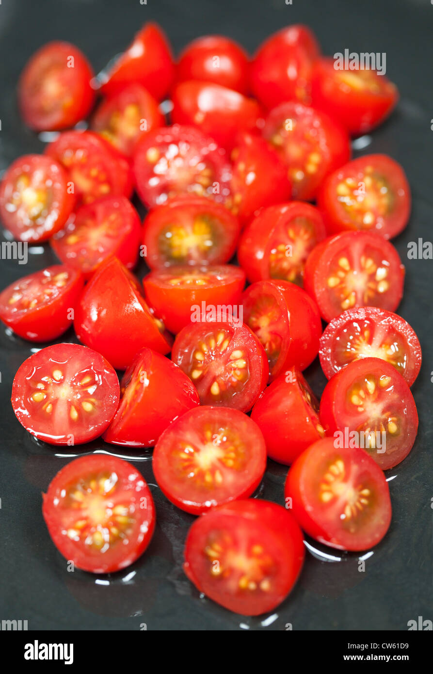 Lots red cherry tomatoes hi-res stock photography and images - Alamy