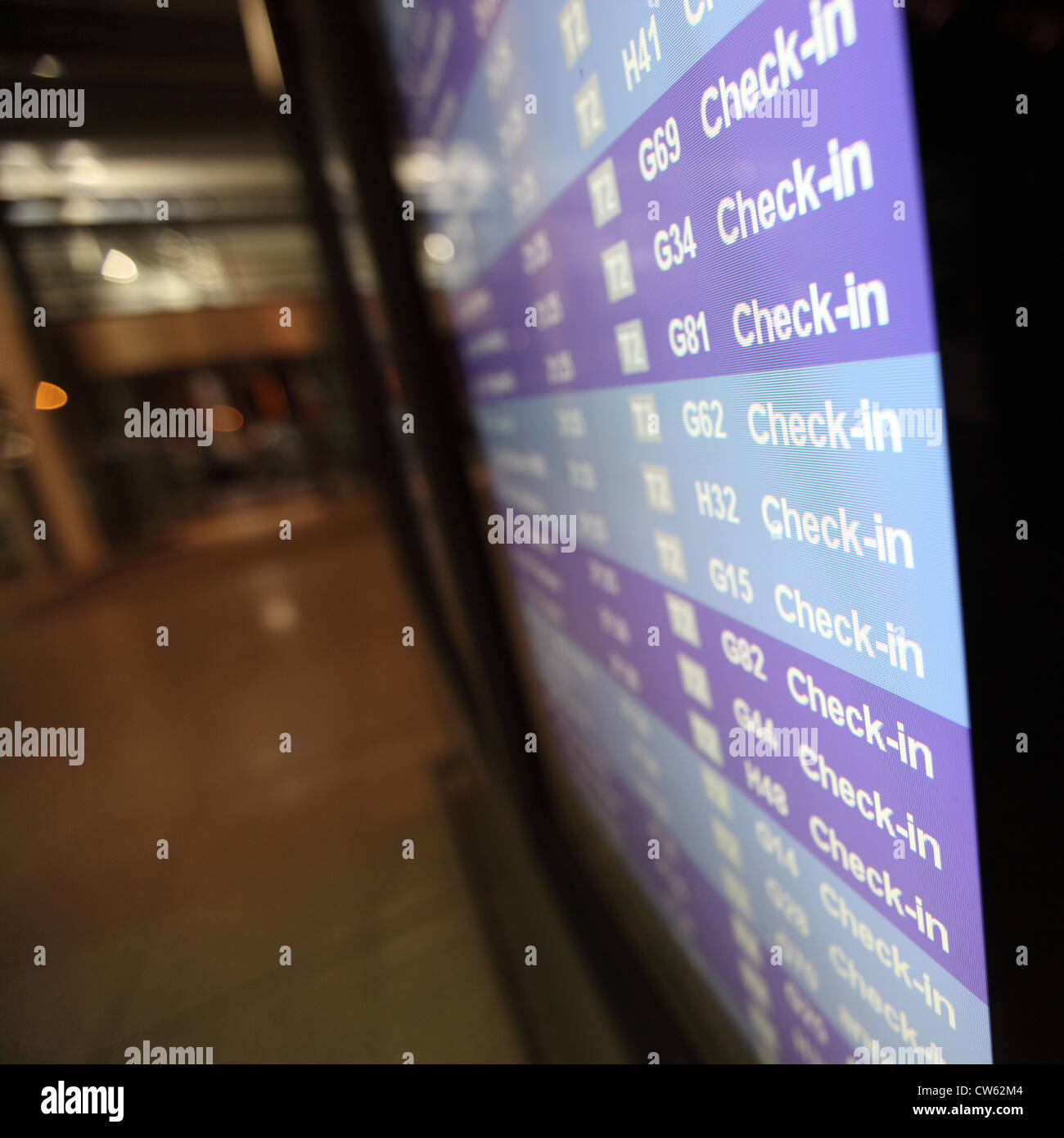 check in desk in airport Stock Photo - Alamy