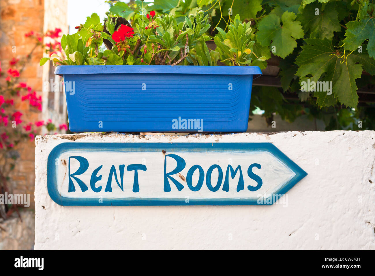 Sign for holiday accommodation in a Greek village Stock Photo - Alamy