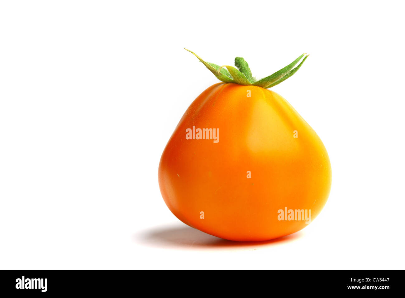 orange tomato isolated on white Stock Photo - Alamy