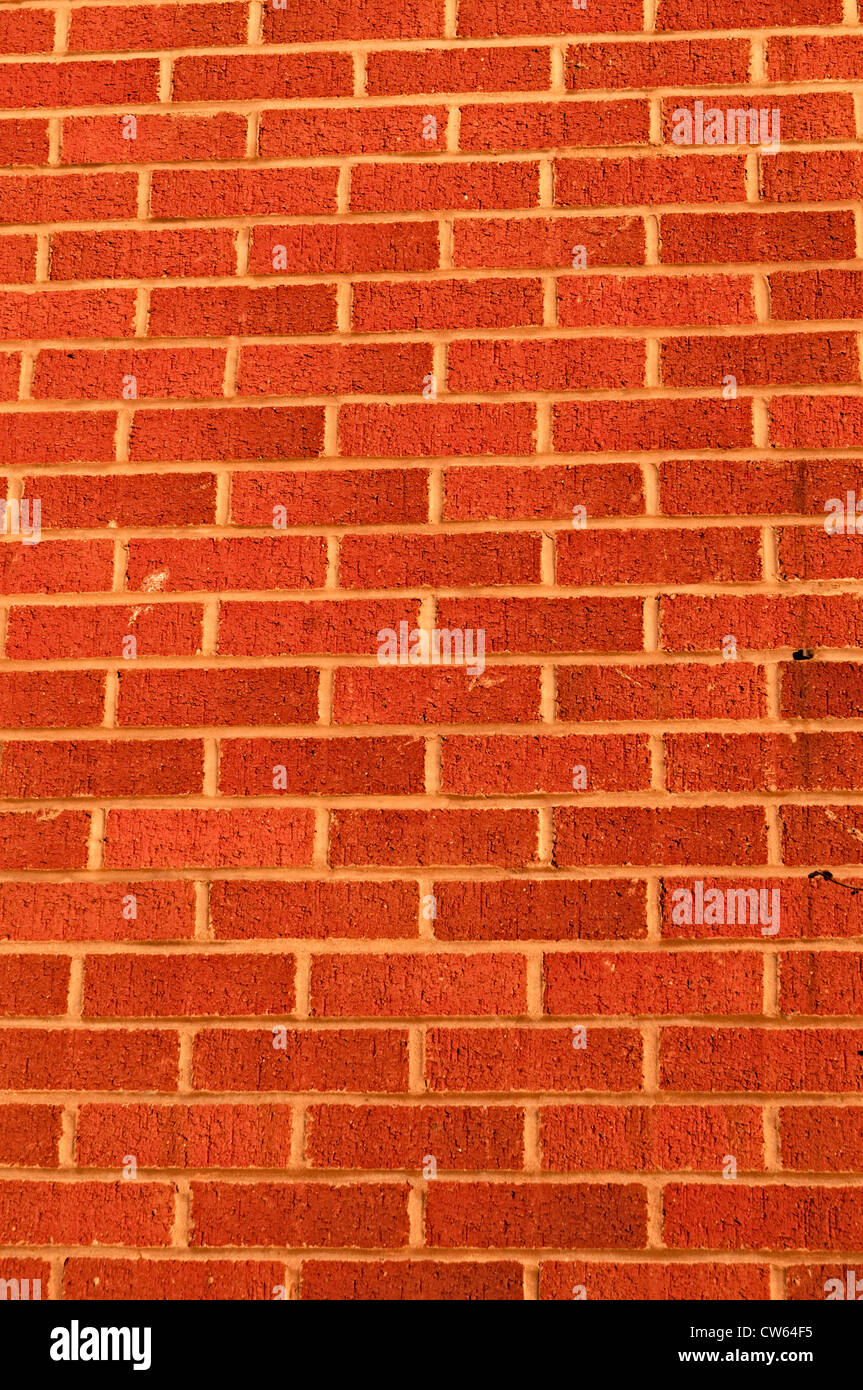 Red brick wall sunshine sunset evening Stock Photo - Alamy