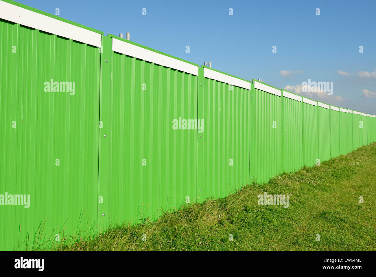 Green metal fence Stock Photo - Alamy