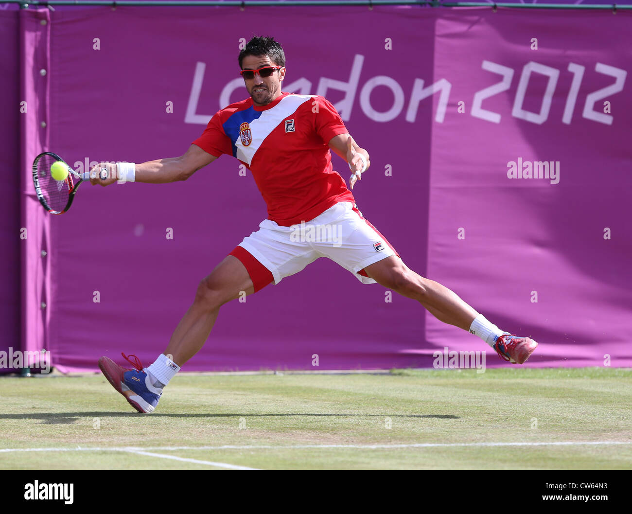 Janko Tipsarevic (SRB) in action at Wimbledon during the Olympic Games ...