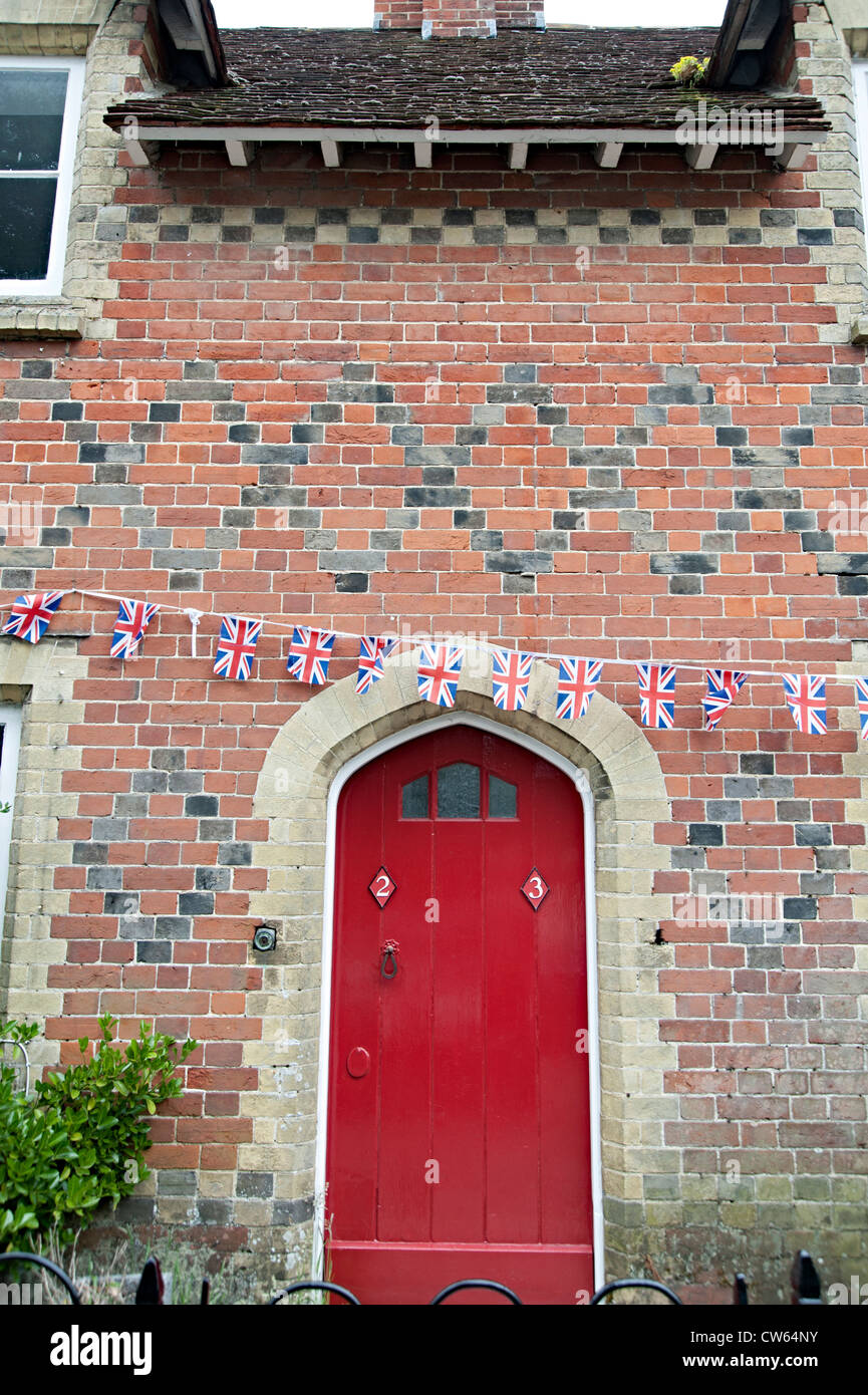 Little red door beaulieu hampshire Stock Photo - Alamy