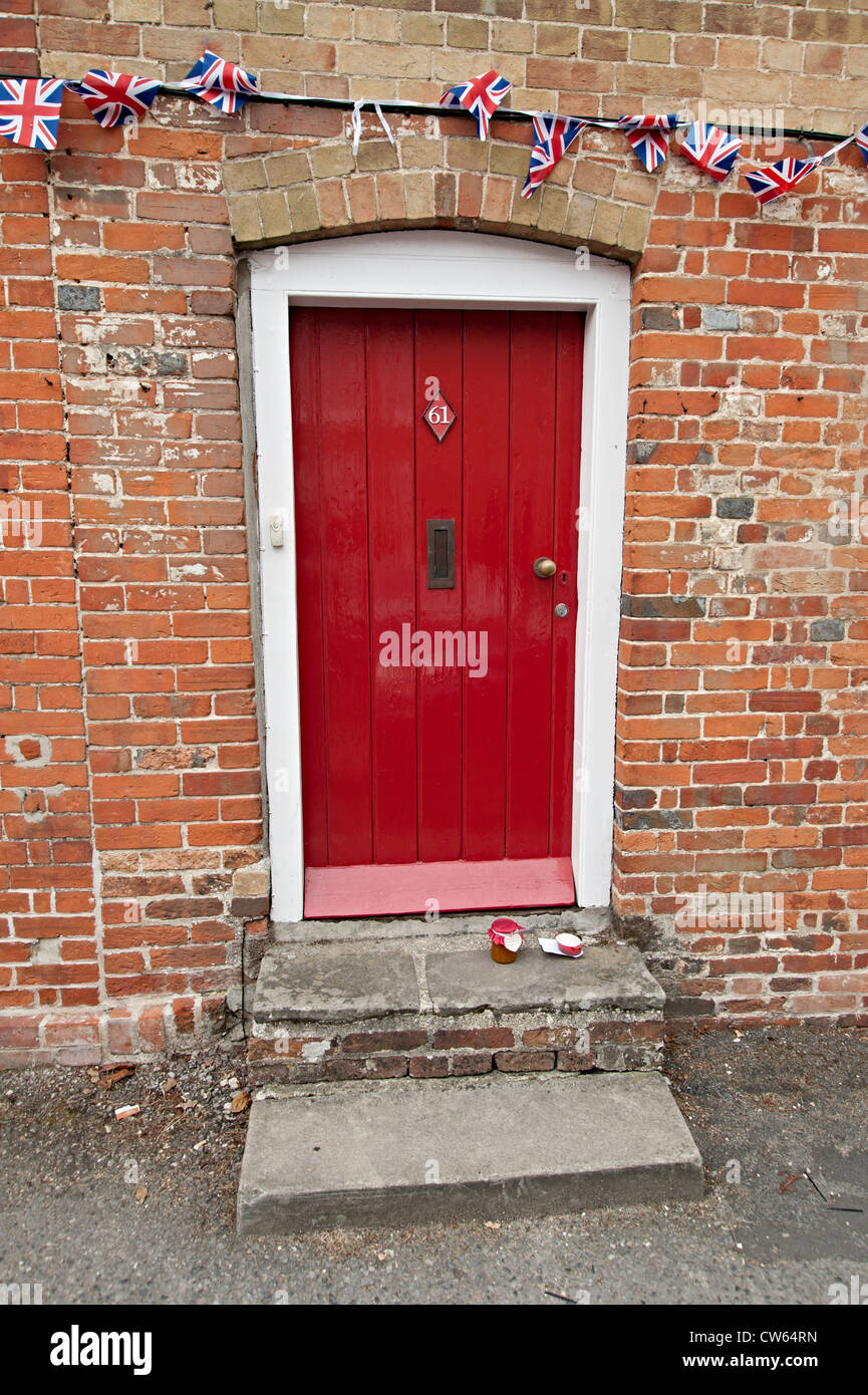 Little red door beaulieu hampshire Stock Photo - Alamy