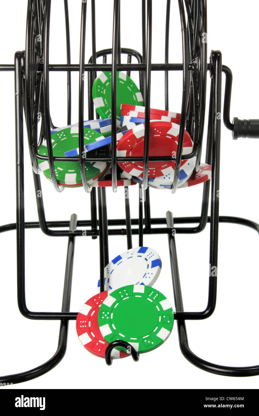 Bingo Game Cage with Poker Chips Stock Photo - Alamy