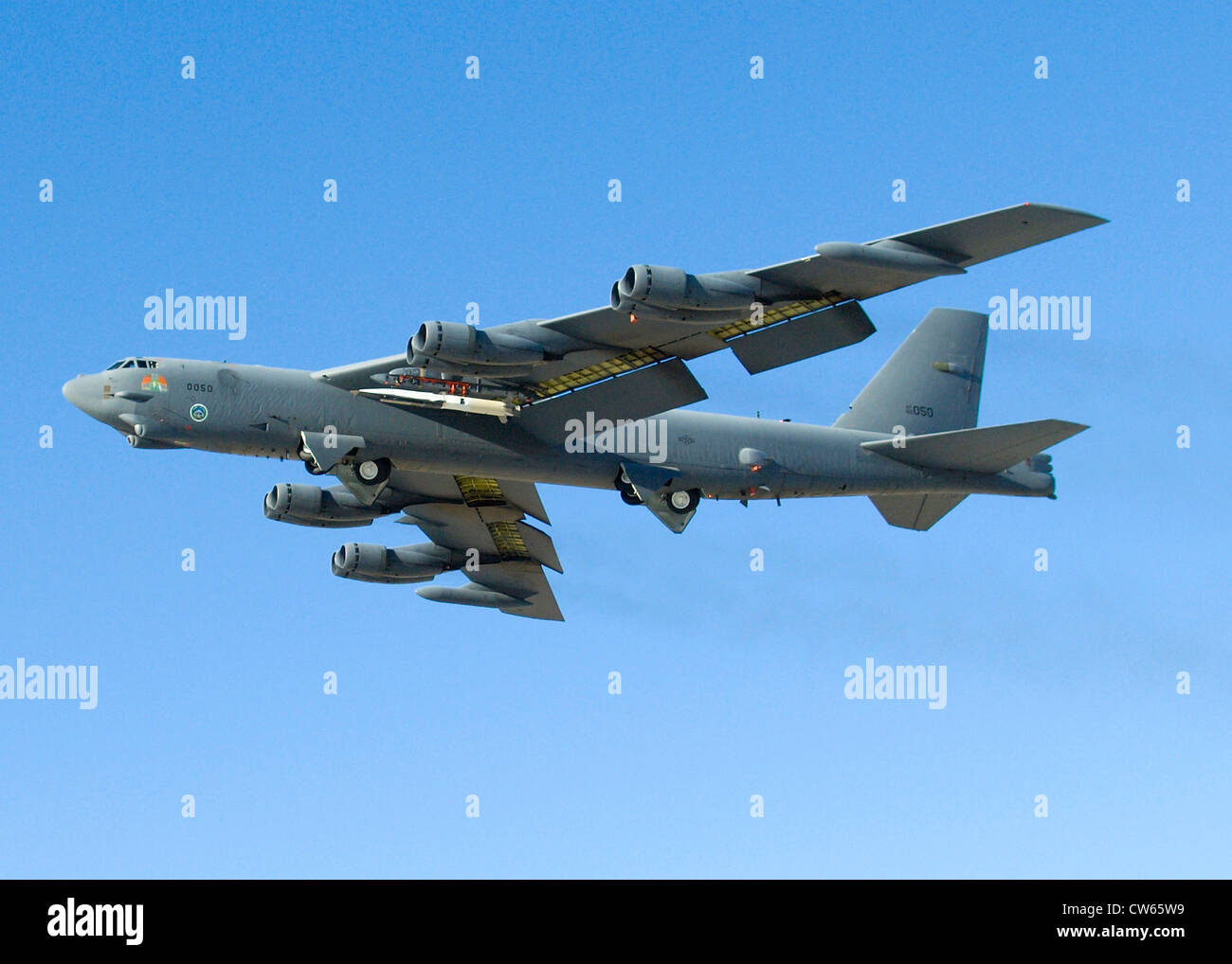 An X-51A Waverider shown mounted from it's launch platform the B-52 ...