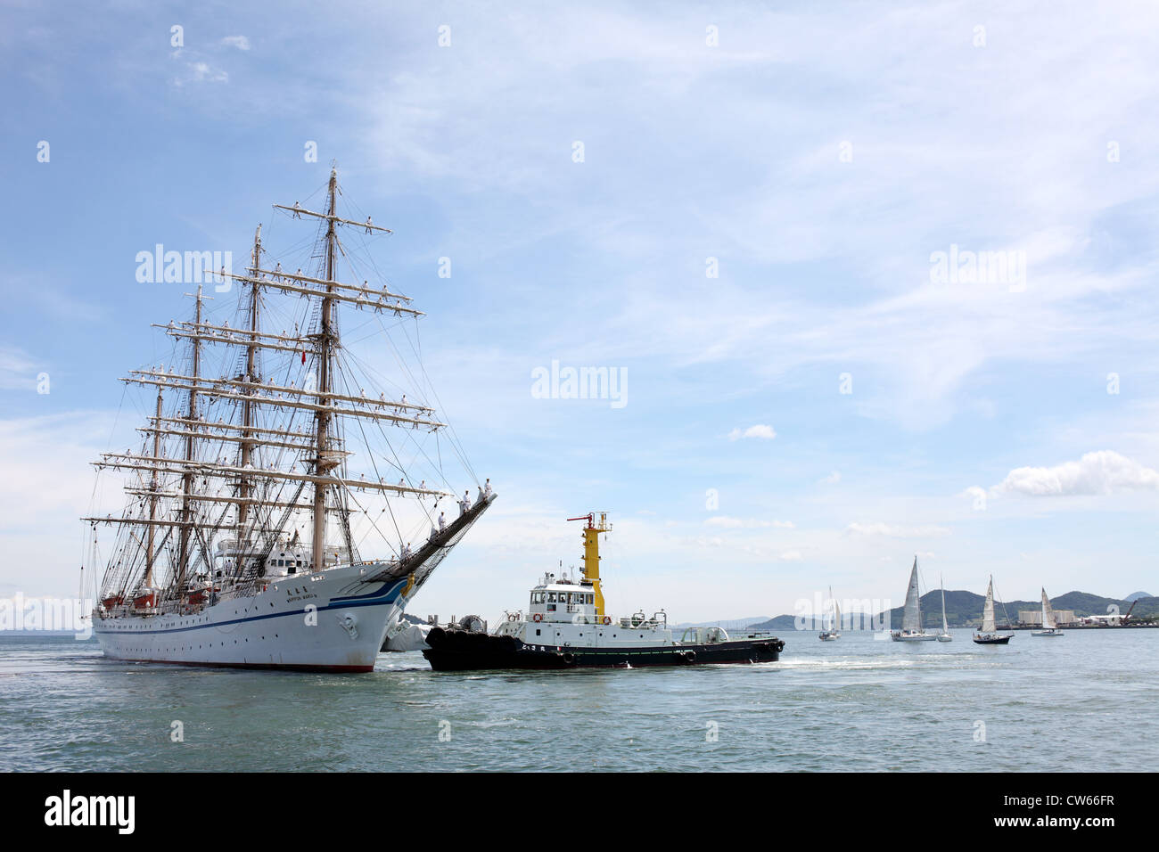 Big sailing ship and sailor men docked at the port Stock Photo - Alamy