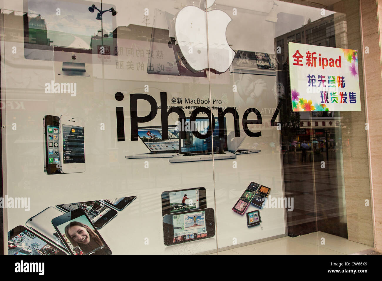 Sign in Chinese advertising the Apple iPhone and iPad in Beijing, China ...