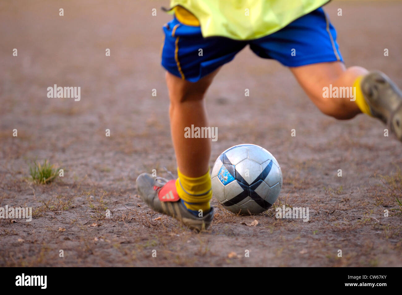 Kids mud soccer hi-res stock photography and images - Alamy
