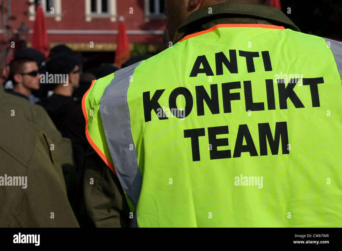 Vest with anti conflict team sign hi-res stock photography and images ...