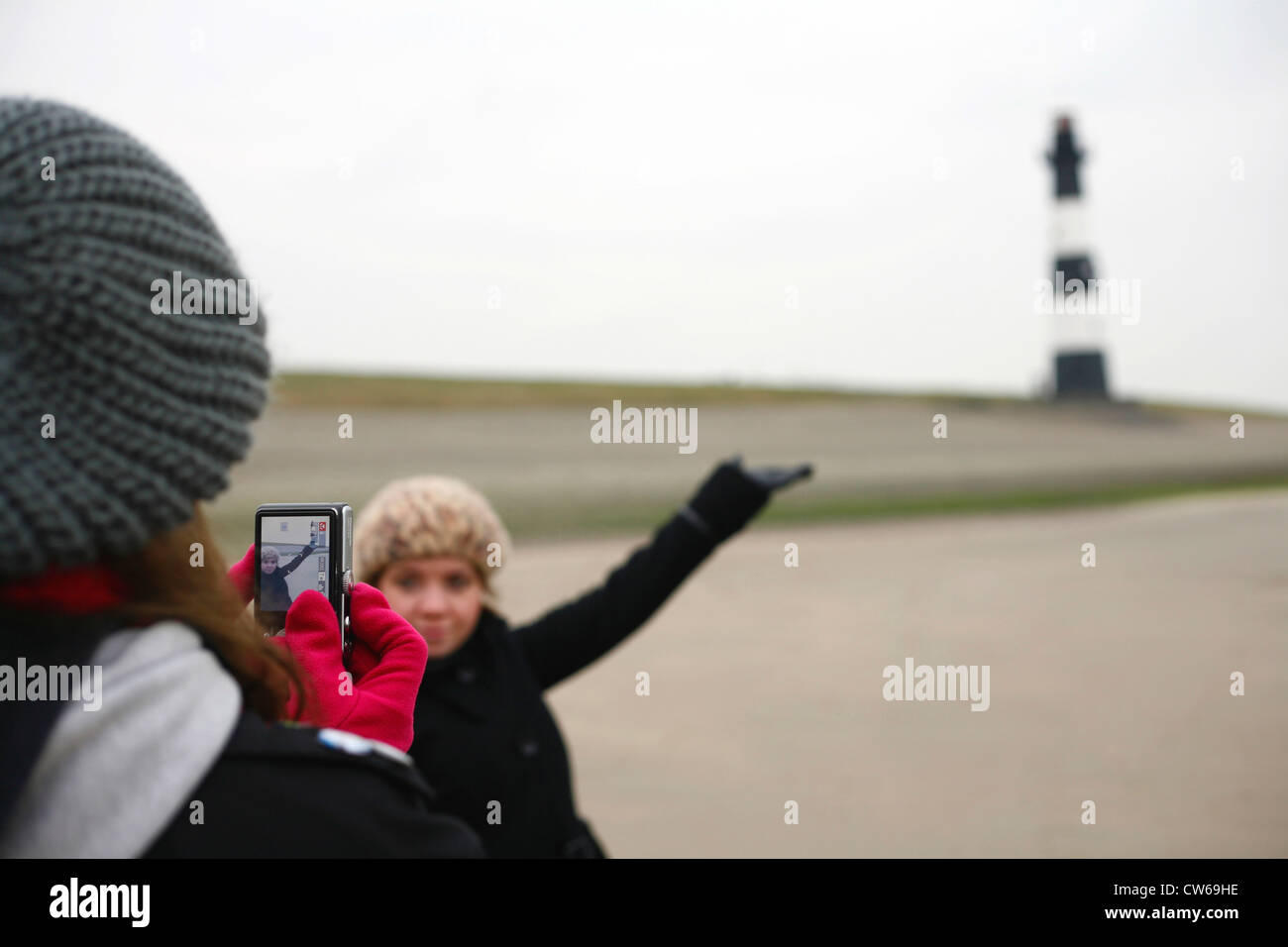 Woman and lighthouse hi-res stock photography and images - Alamy