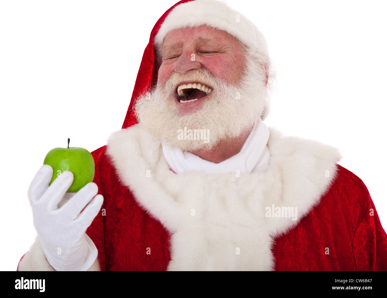 Portrait of laughing Santa Claus holding green apple. All on white ...