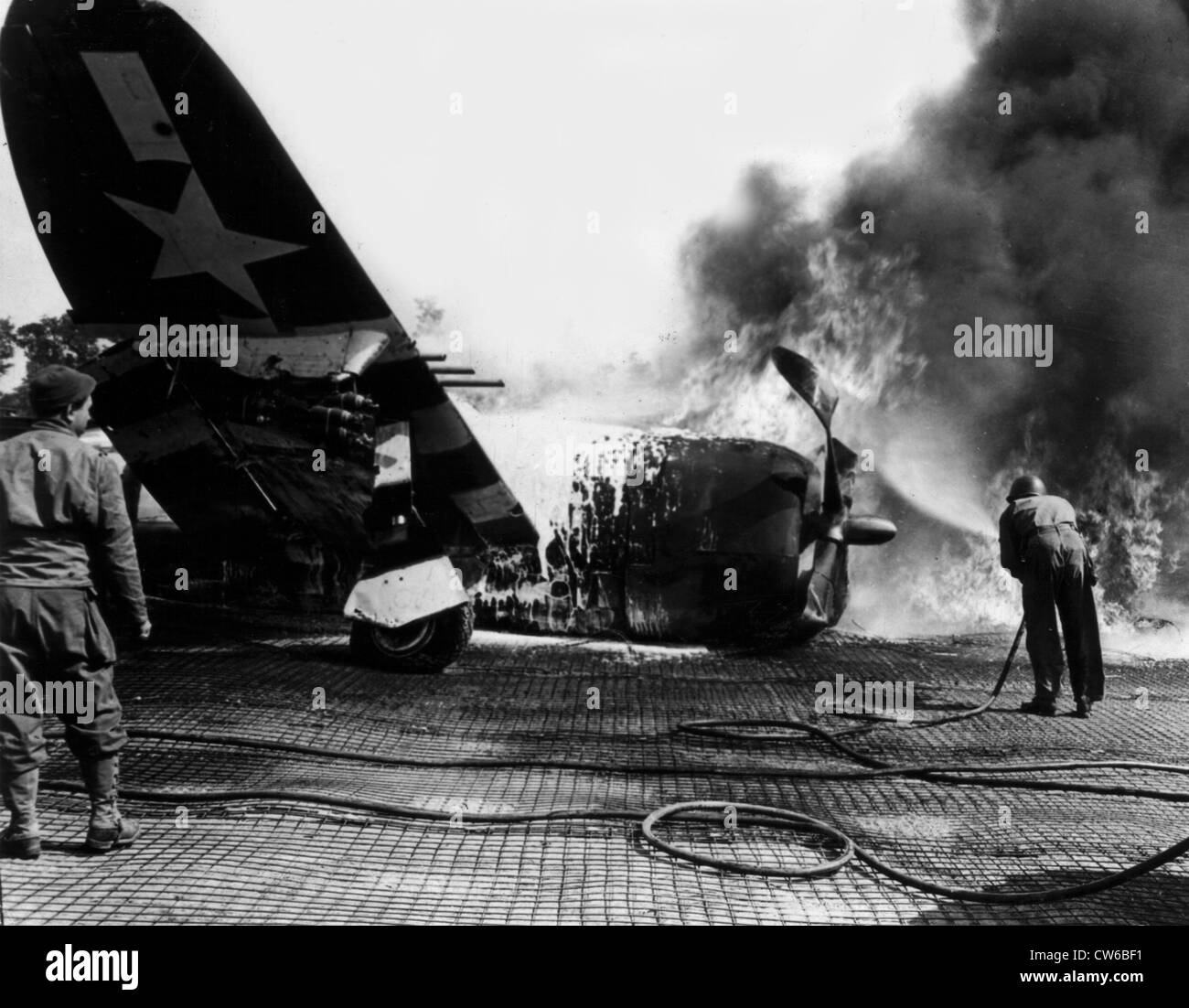 A P-47 burns on airfield somewhere in Normandy (Summer 1944 Stock Photo ...