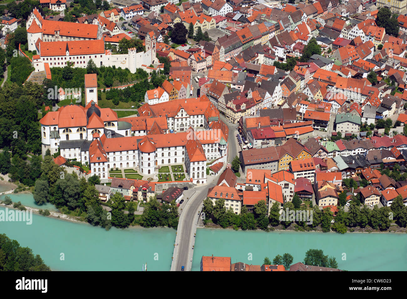 view on Fuessen with Lech river, church St. Mang, castle and old city ...