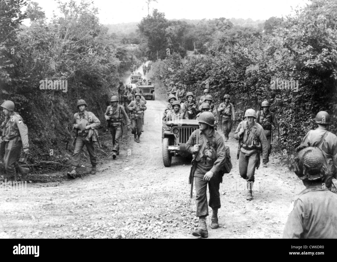 American troops pursue retreating Germans in Normandy, Summer 1944 ...