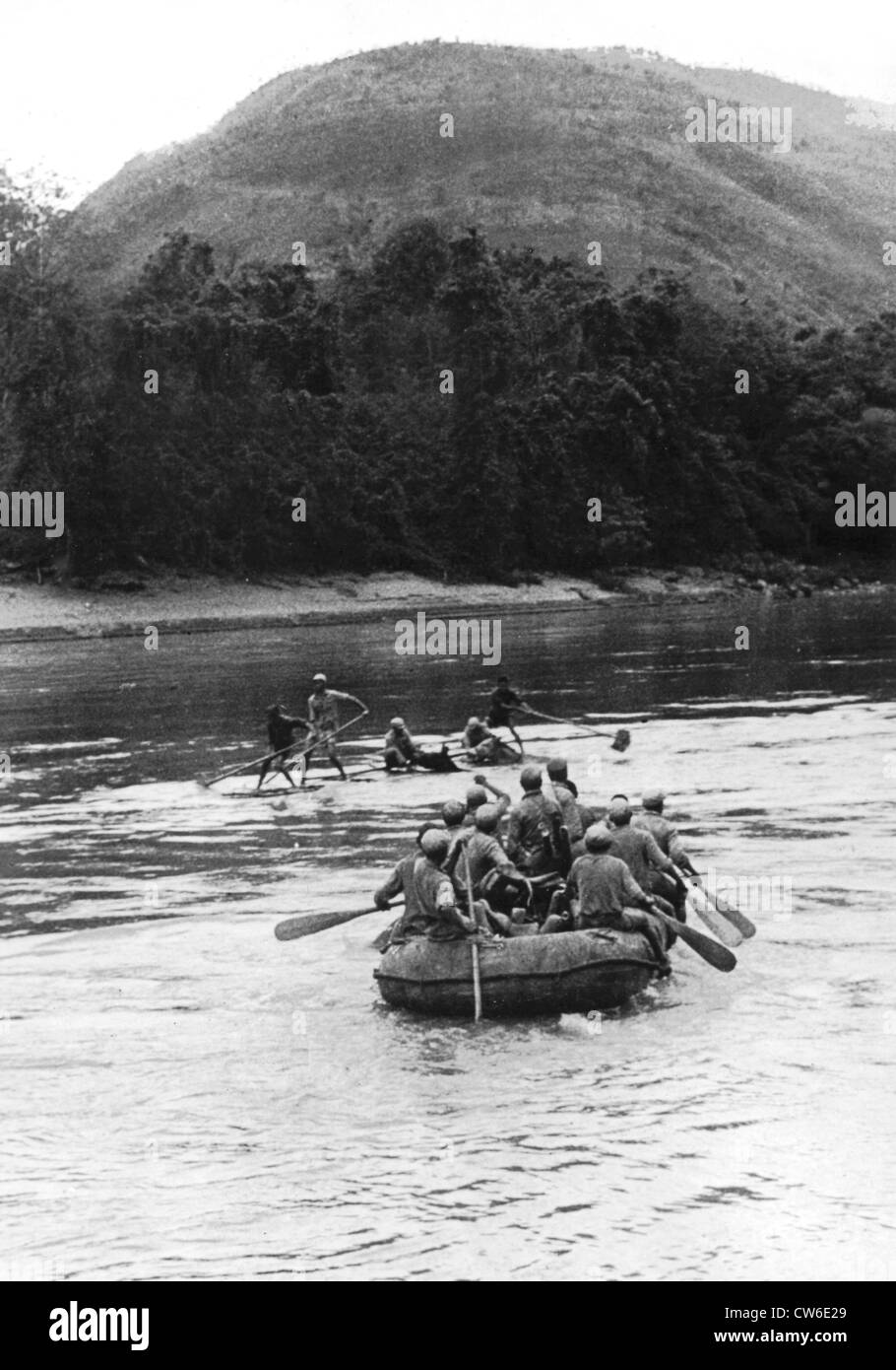 Chinese soldiers ferry across Salween river in China, 1944 Stock Photo ...