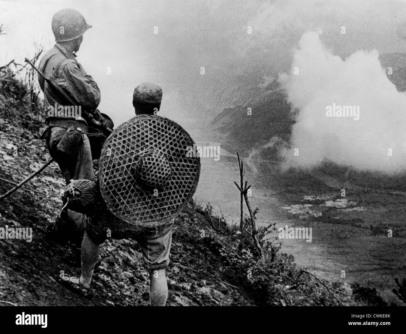 American and Chinese soldier observe Salween River battle, 1944 Stock ...