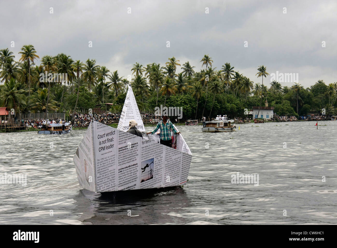 strange unusual funny news paper boat in water during nehru trophy ...