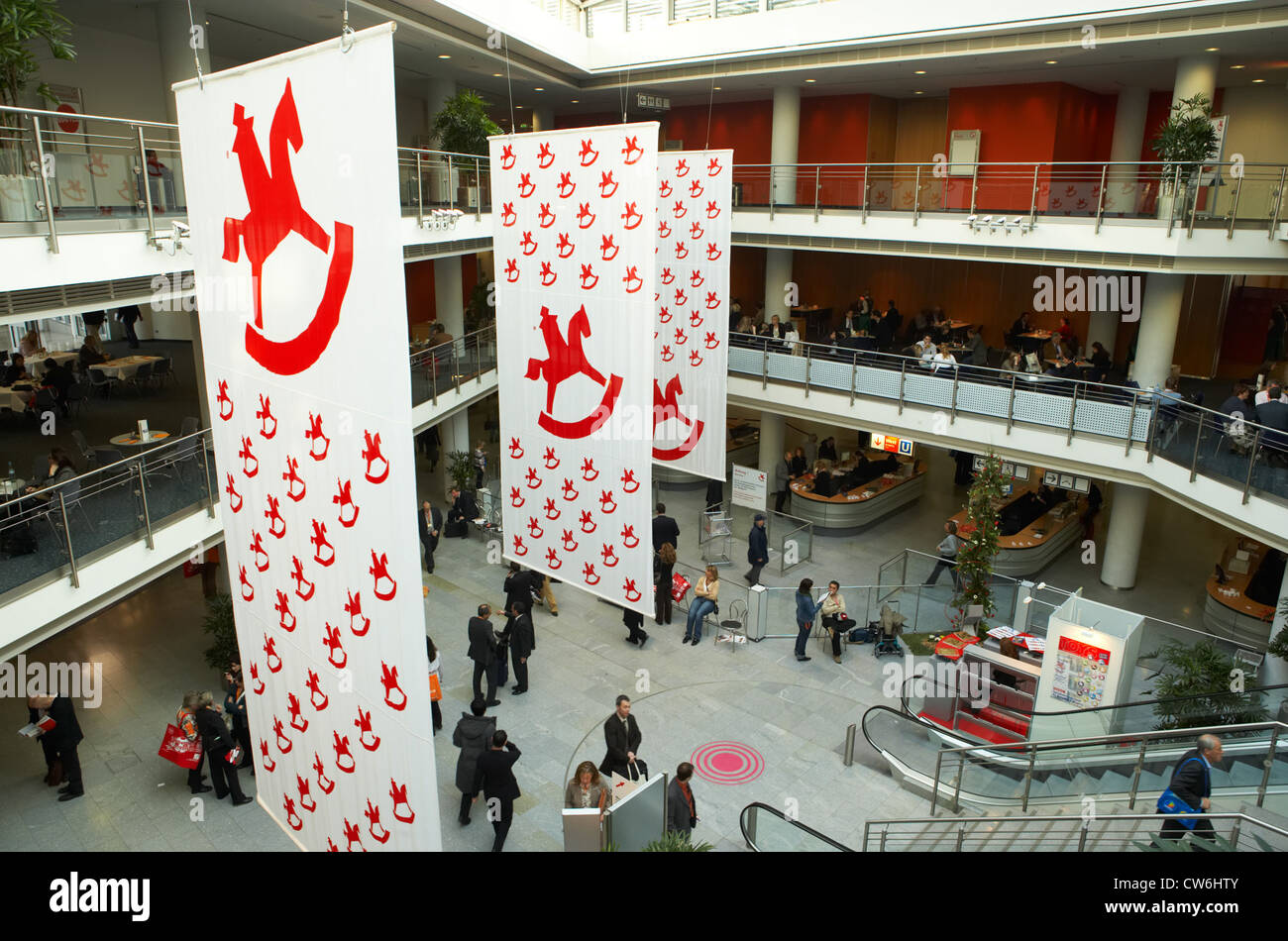 Nuernberg - flags with the logo of the toy fair in an atrium Stock ...