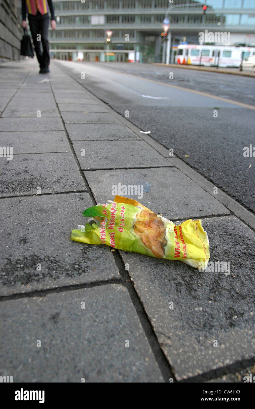garbage on a pavement Stock Photo - Alamy